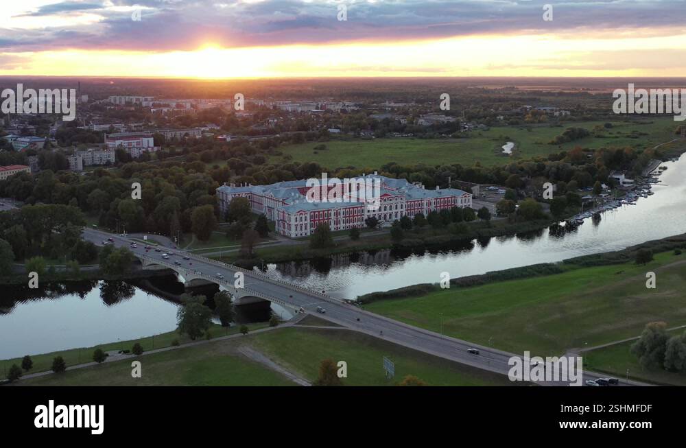 Take in the majestic beauty of an 18th-century palace near a river, a ...