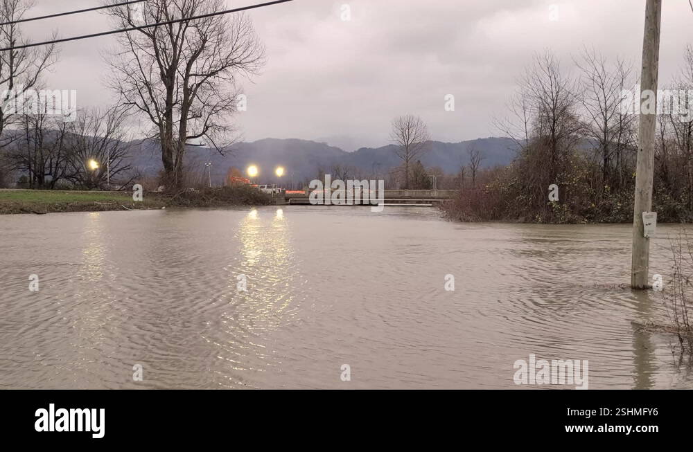 Telephone poles under water due to flooding in rural area Stock Video ...