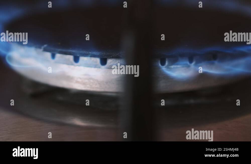 Turning on the Flame of a Gas Burner in the Kitchen, Close-up of a Gas ...