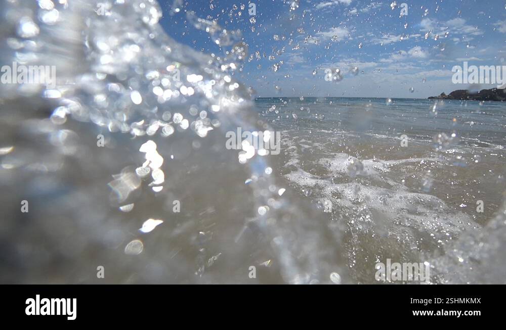 Ocean shimmers and sparkles in the sun, in slo-mo footage captures ...
