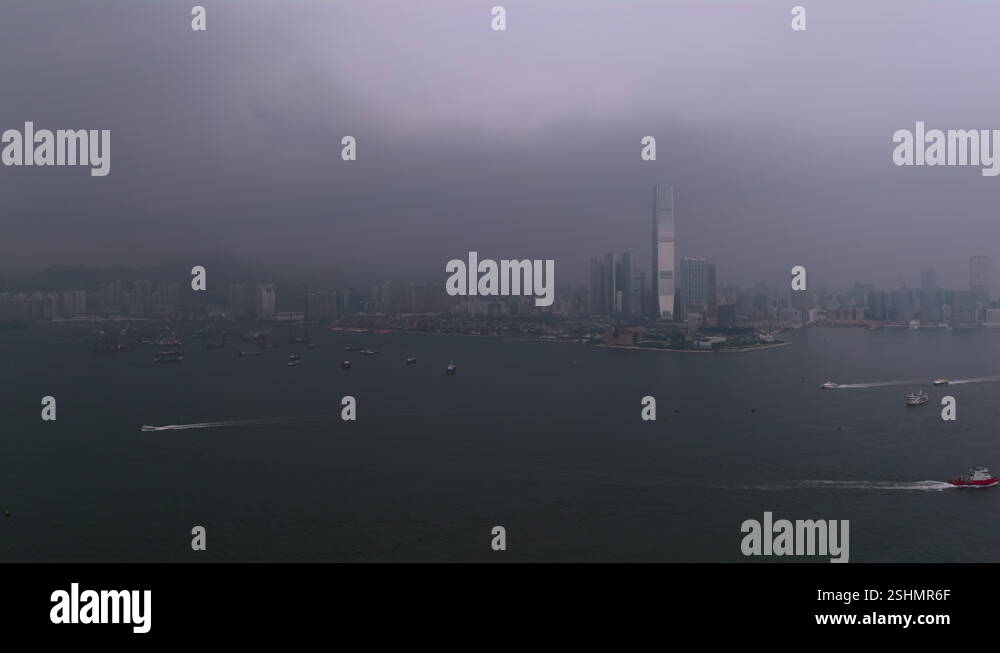 Wide shot of heavy thunderstorm and lightning strike near ICC Building ...