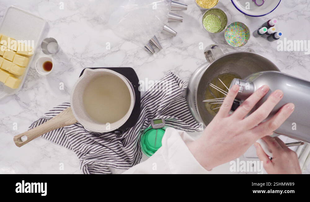 Flat lay. Caramelizing sugar in a saucepan for Italian buttercream ...