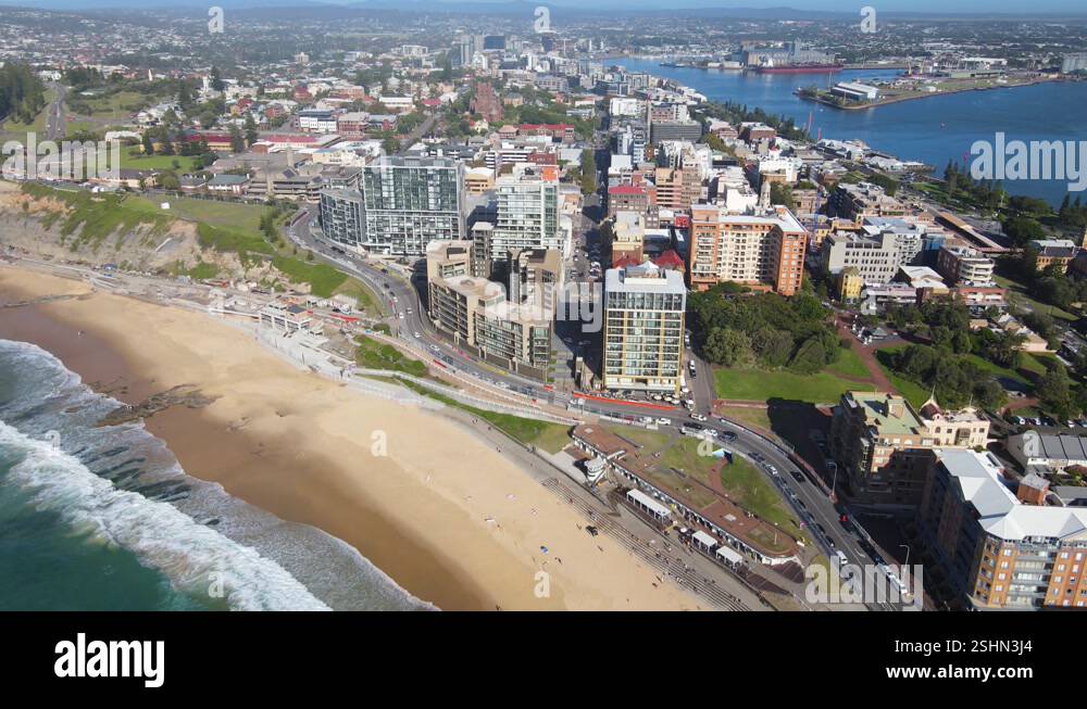 Aerial drone reverse view of the harbour city of Newcastle, NSW ...