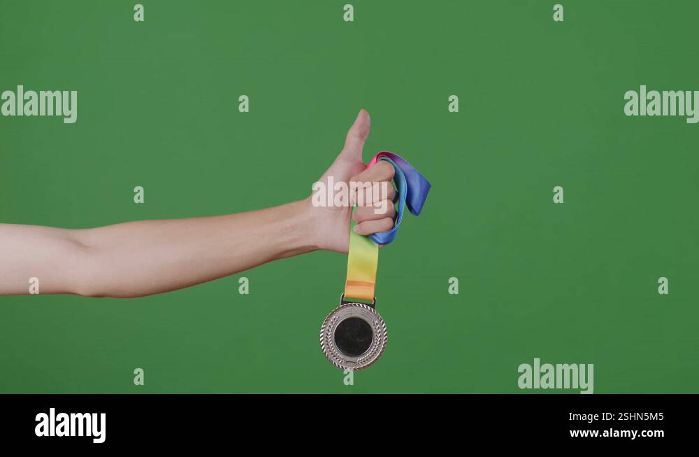 Golden Medal In Hand. Green Screen Background Stock Video Footage - Alamy