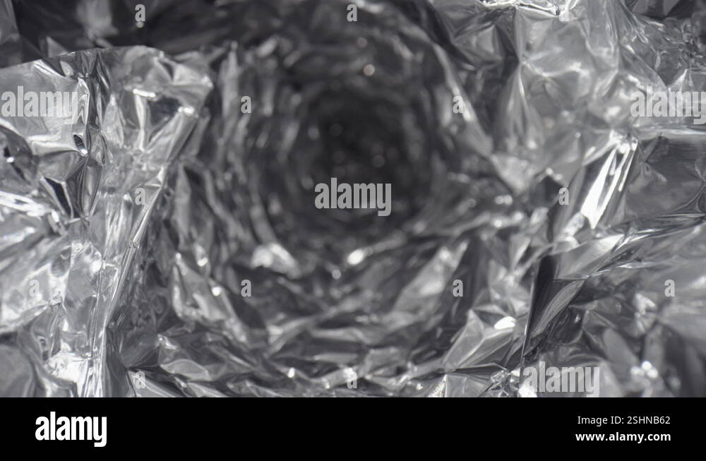 Dolly foil tunnel, shiny crumpled silver metal texture, mashed metal ...