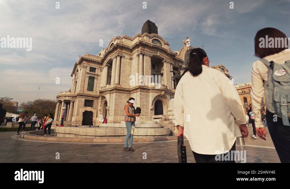 Palace of Fine Arts is a prominent cultural center in Mexico City. Slow ...