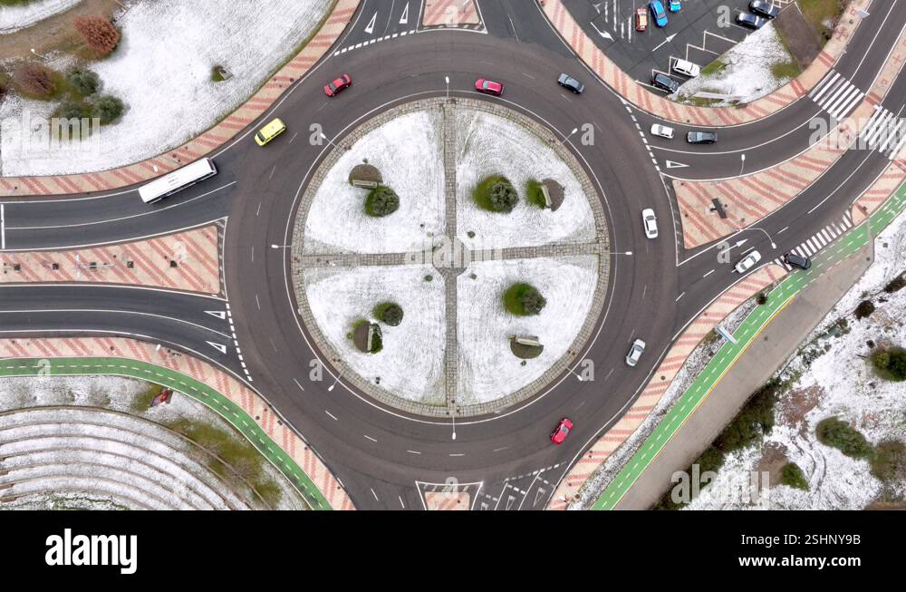 Roundabout covered in snow, bird's eye view Stock Video Footage - Alamy