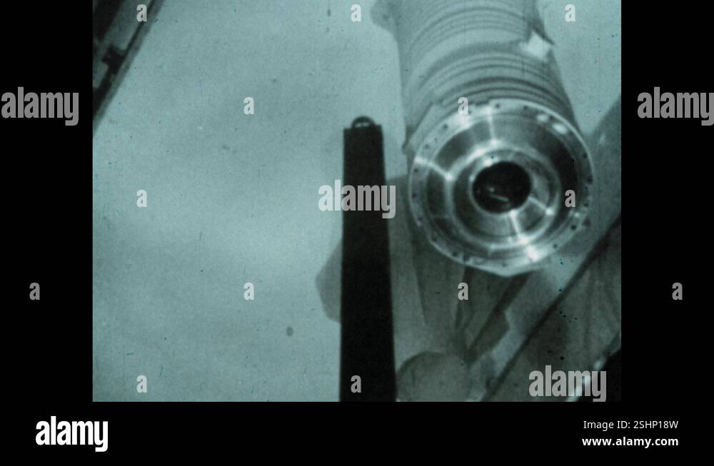 1960s: Scientists lower instrument down pole. Rod is slotted into metal ...