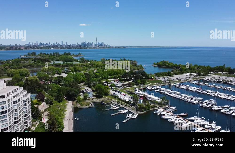 Drone circling over sunny summer harbor on Lake Ontario near Toronto ...