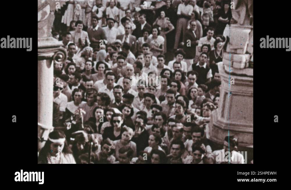 1950s: Parade float. Crowd. City on water. Bridge. Ships. Cable car ...
