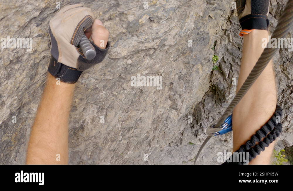 POV Summer activities, man on Via ferrata in the Swiss Alps Stock Video ...