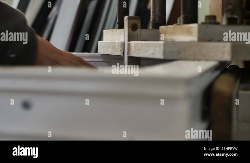 Close-up of the process of soldering a PVC profile in a special ...