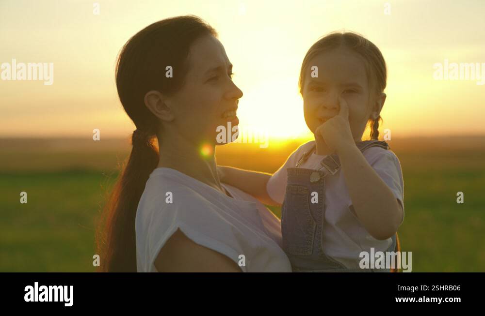 Happy family, mom hugging her daughter in summer park. Mother, child, hugging Stock Video ...