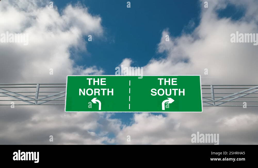 Road signs pointing in opposite directions to the north and to the ...
