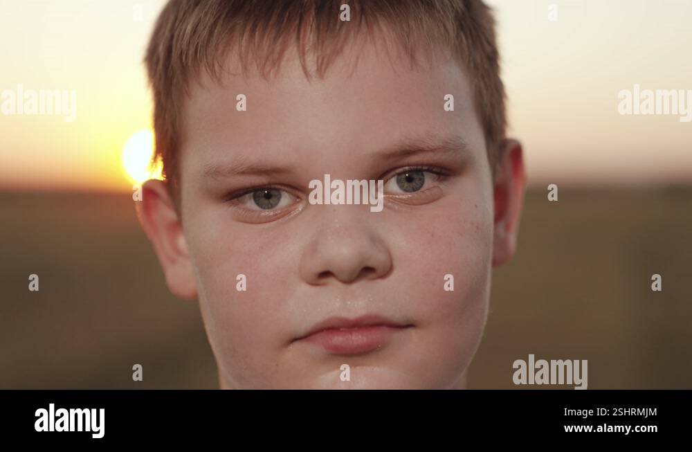 Tired boy. Lonely child. Portrait of sweaty boy looking at camera ...