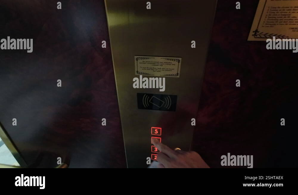 Push button in elevator with floor level 5. Luxury interior in hotel ...