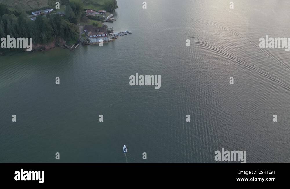 Giant cross in the middle of the Guatape reservoir and the Guatape ...