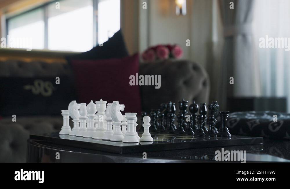 A Set Of Chess Board Game On A Table Inside A Luxury Residence. Close ...