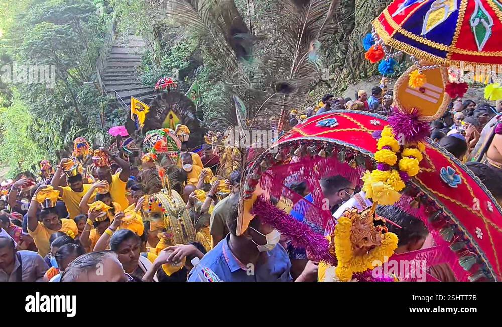 Beautiful Kavadi carried by hindus walking on stairs of Murugan temple ...