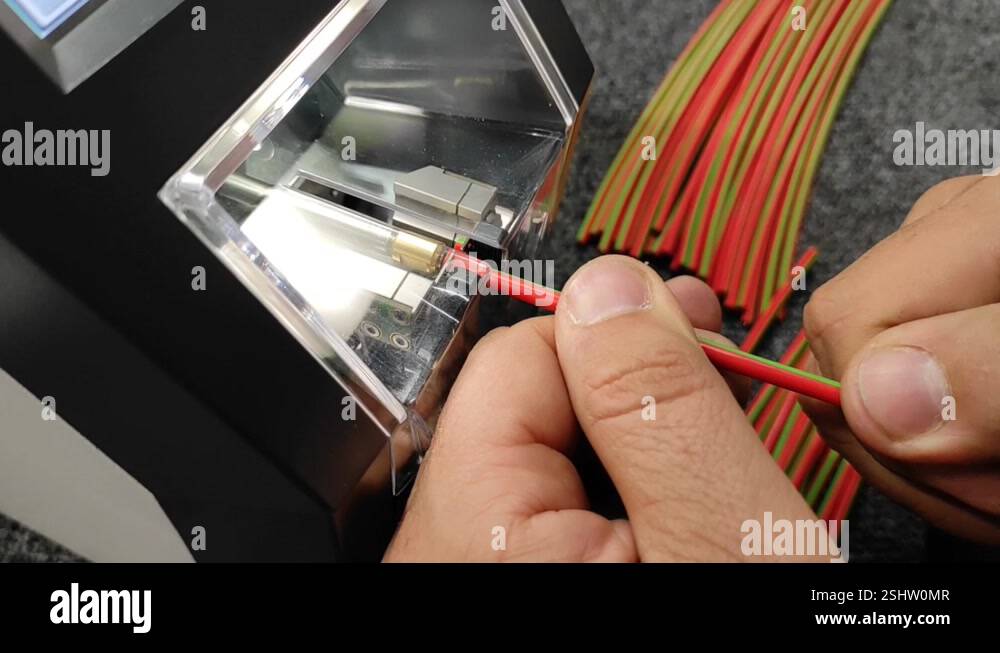 automated wire stripping machine. Preparation of wiring for a car Stock ...