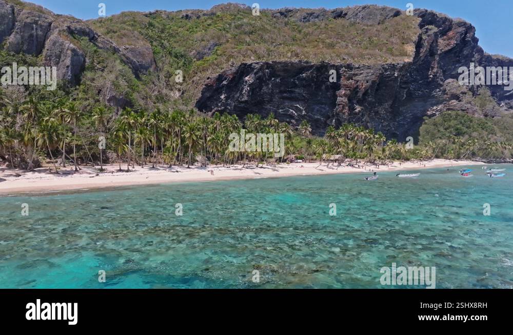 Paradise Beach With Dense Palm Trees On Foreshore At Playa Fronton In ...