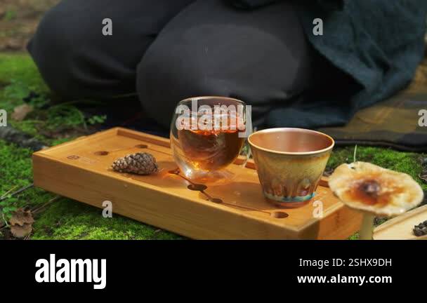 A soothing video showcases serene tea momentsan arranged cup on a tray ...