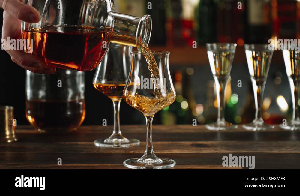 Super Slow Motion Shot of Pouring Rum into Glass at 1000fps with Camera ...