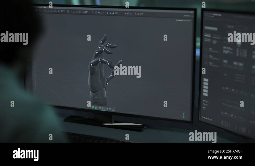 Specialist creating a prototype of a futuristic hand model in computer ...