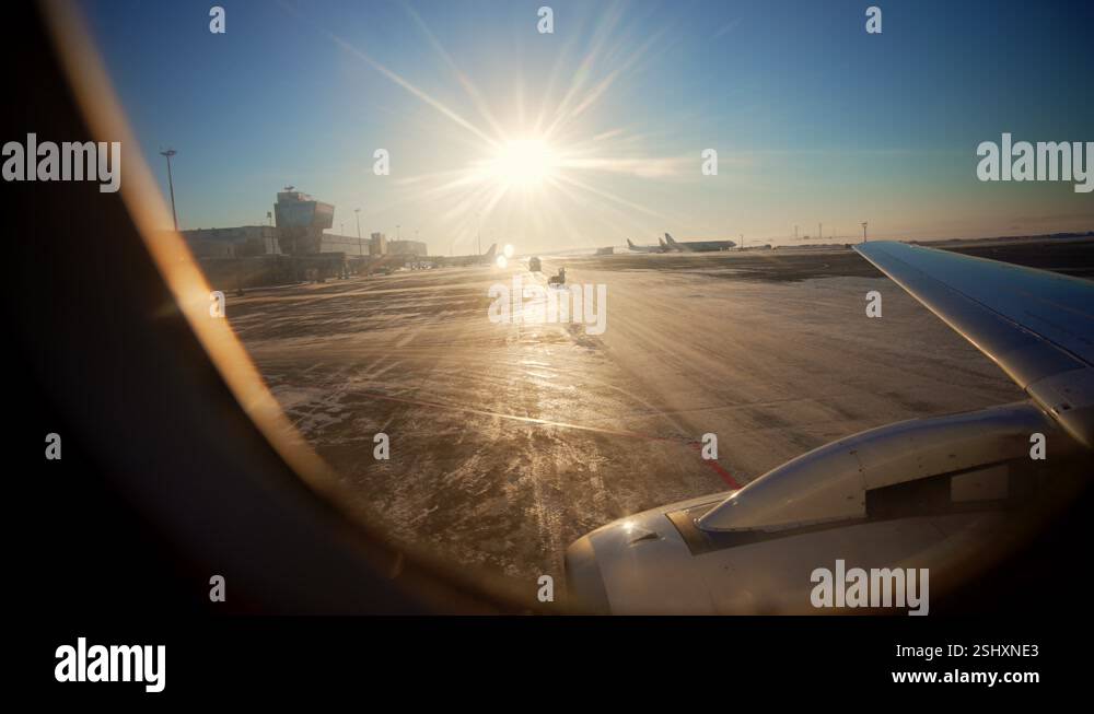 View from window of an airplane during takeoff or landing. Wing of ...