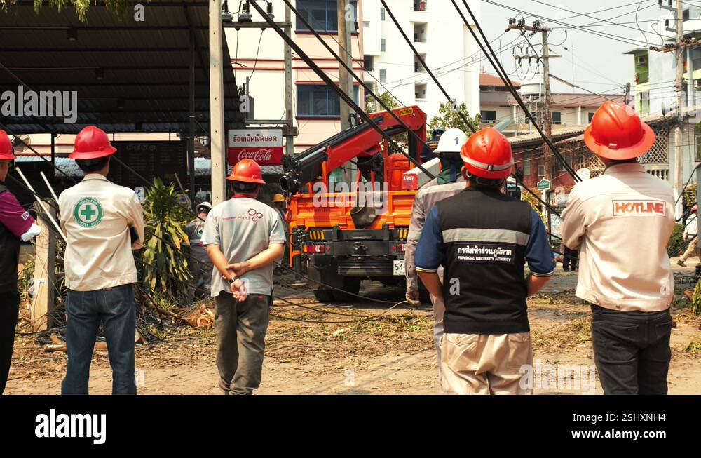 Electrician workers repair the breakdown of electrical wires on power ...