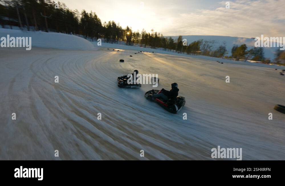 Gokart race between two drivers on an frozen lake ice track Stock Video ...