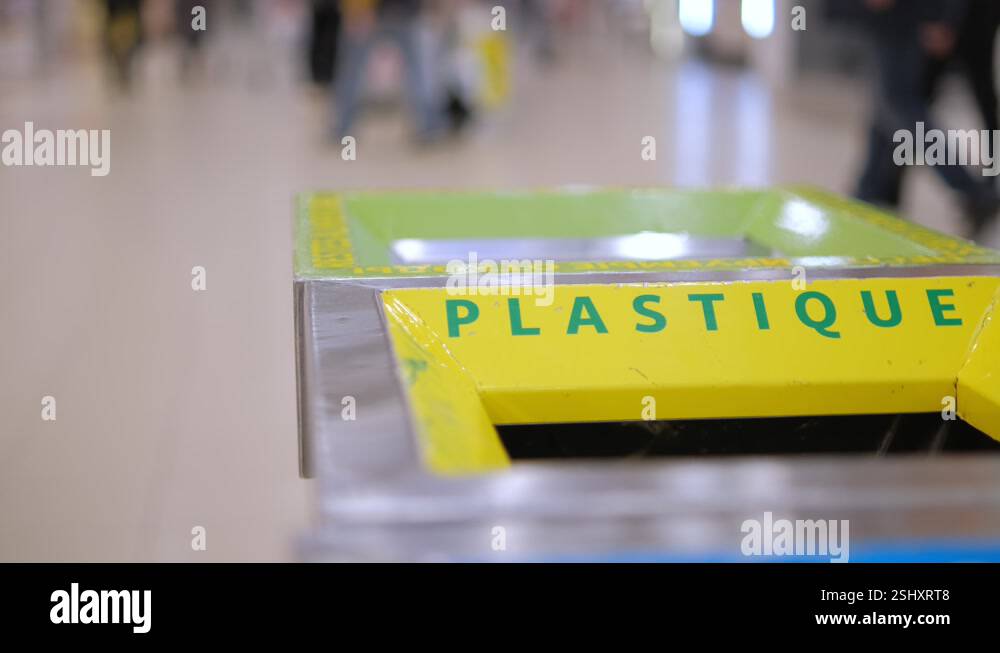 Plastic garbage bin trash container. Human waste recycling can. hand ...