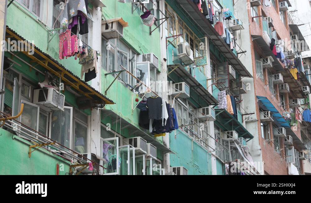 Crowded old residential housing apartment building seen in Kowloon ...