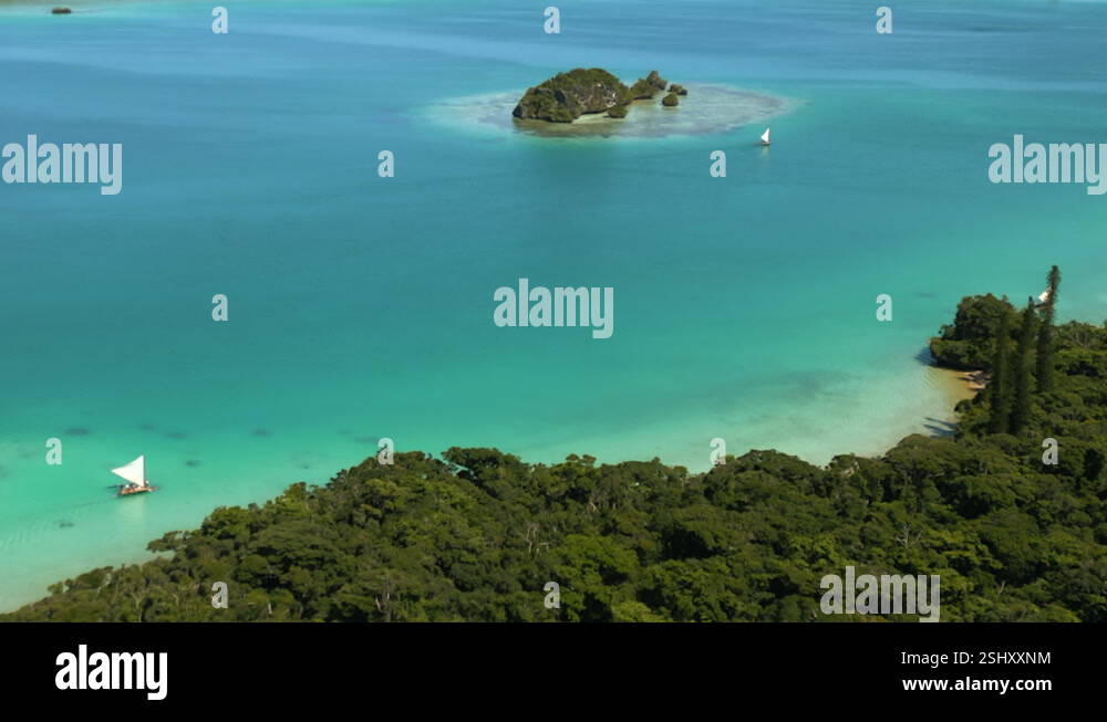 Pirogue outrigger sailboats transport tourists to explore uninhabited ...