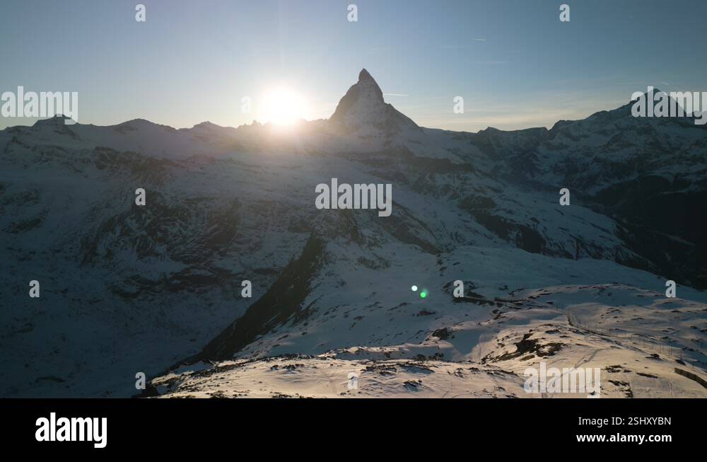 Incredible Matterhorn Landscape. Aerial Boom Shot during Sunset. Lens ...