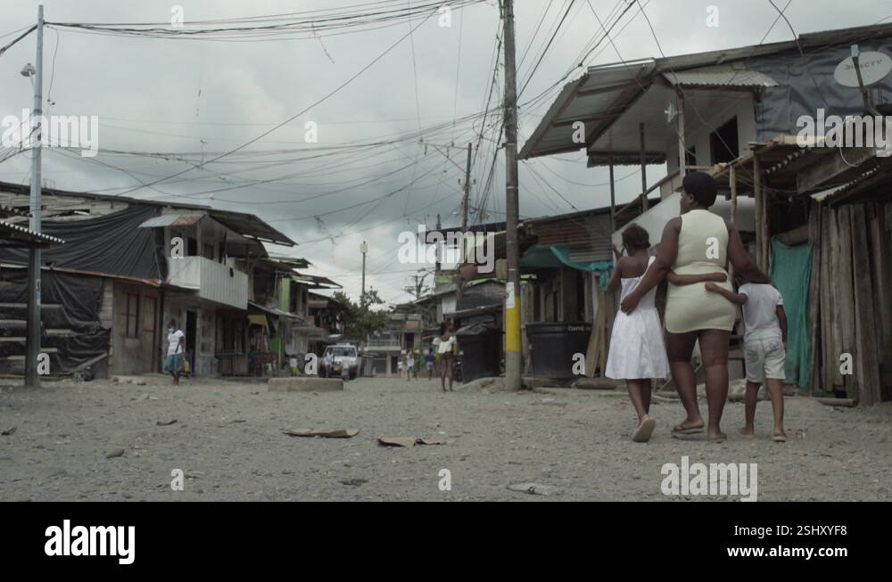 Traveling at a poor street of a rough neighborhood in Buenaventura, at ...