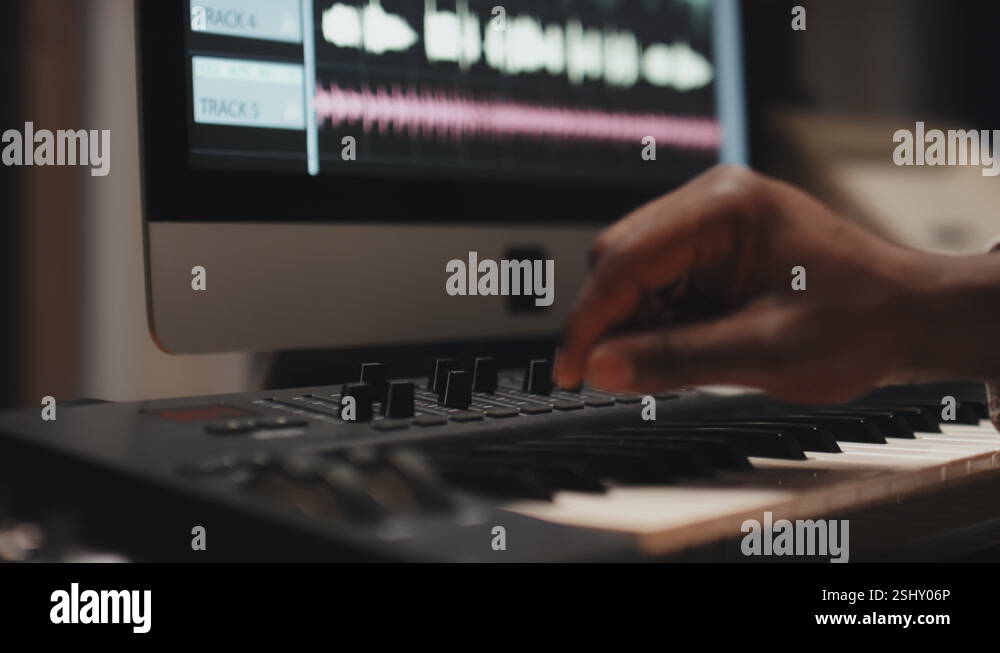 Black Hand Moving Audio Mixer Knobs On Keyboard Stock Video Footage - Alamy