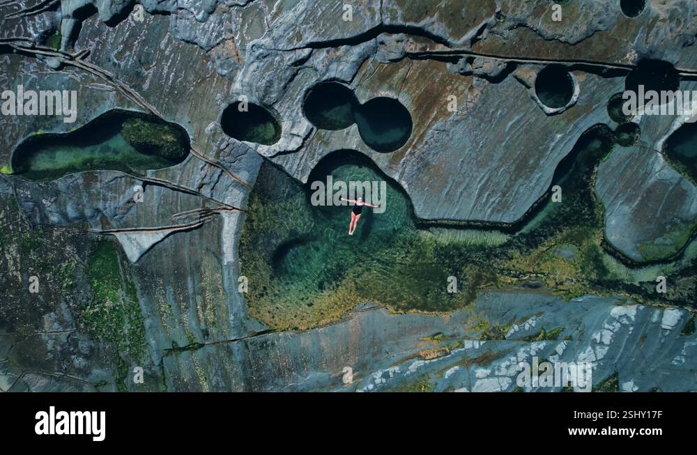 Figure 8 Pool, Australia, Drone Ascending Shot, Girl Floating in Pool ...
