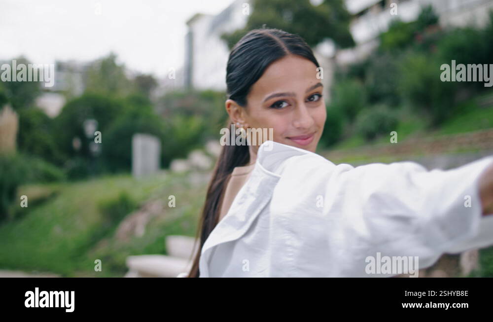 Flirting lady posing camera park close up. Happy carefree woman dancing ...