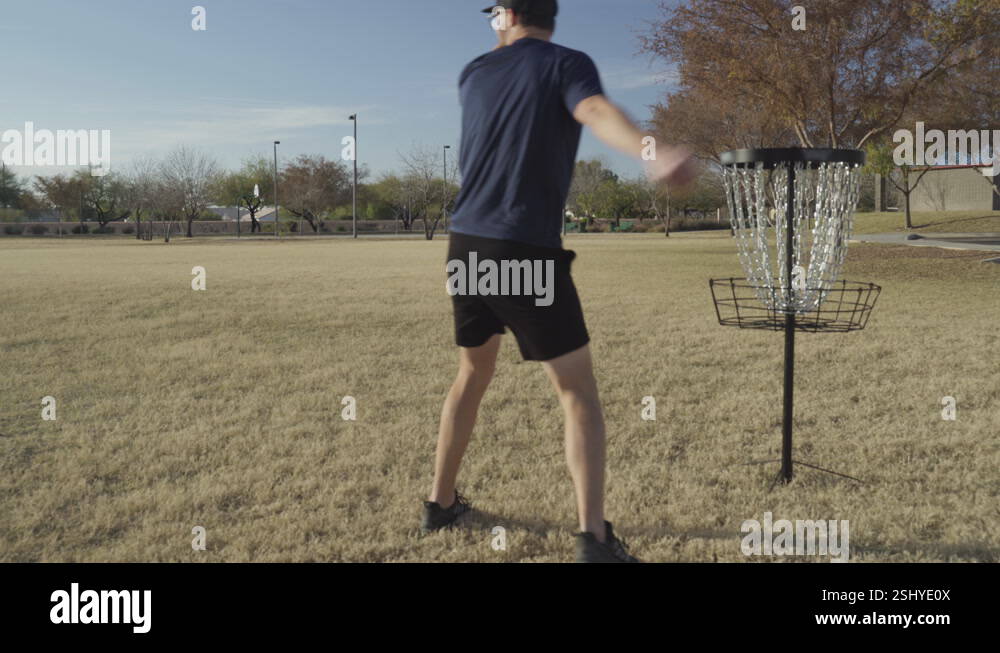 Side View of the Disc Golf Backhand Throw Stock Video Footage - Alamy