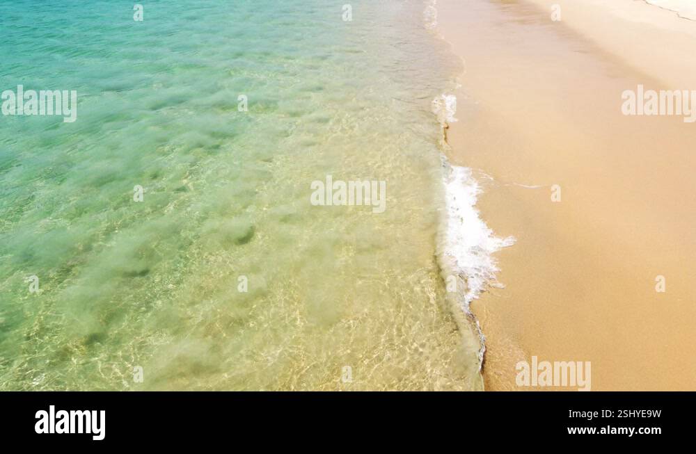 Sea waves and beautiful sand beach aerial view drone shot Stock Video ...