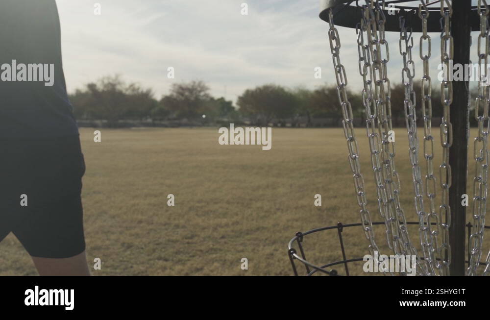 Man Smashes Disc into Cage of Disc Golf Basket in Frustration of ...