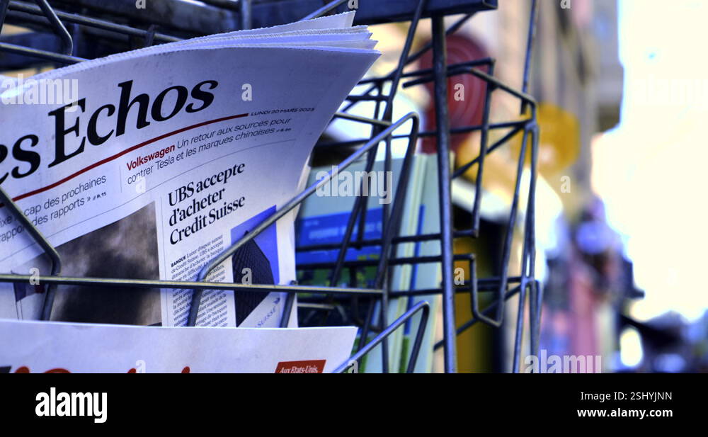 Blur color cast over Press mass media kiosk with headline of French ...