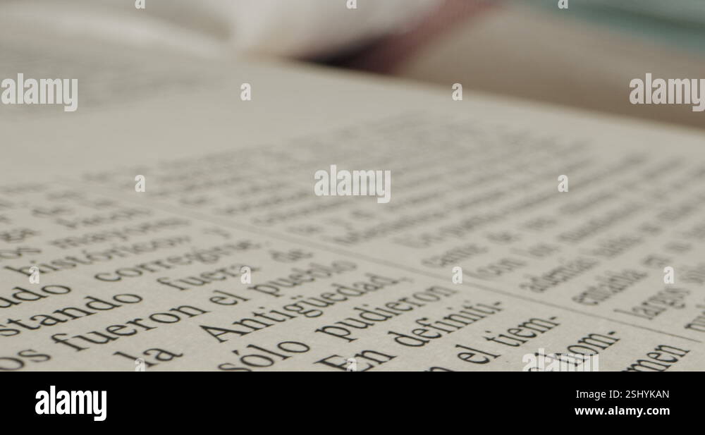 Close up of old Spanish language book with laowa probe lens on slider ...