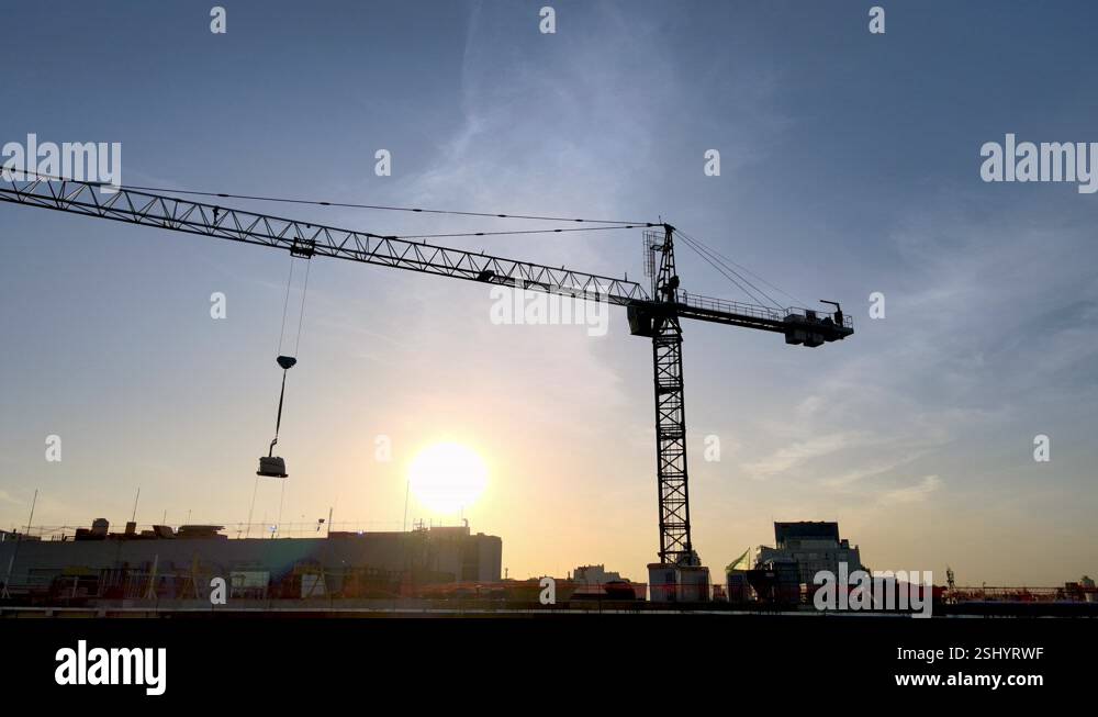 Crane moving heavy loads construction Stock Videos & Footage - HD and ...