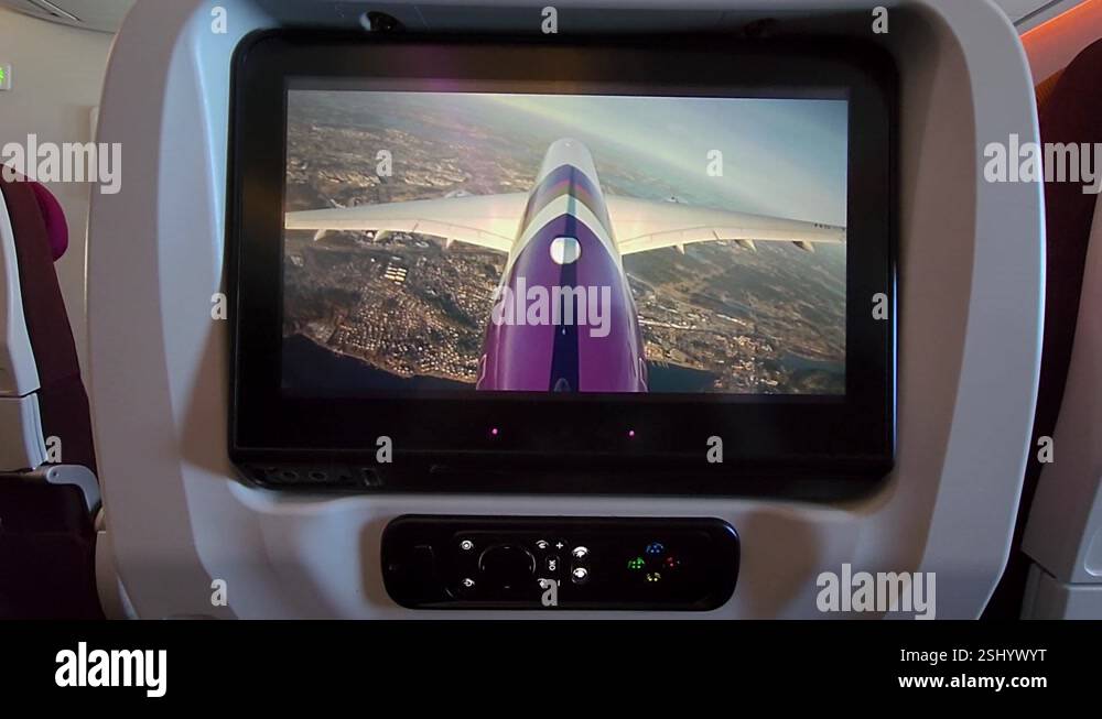 Airplane tv on back of seat of Thai Airways, showing the plane live ...