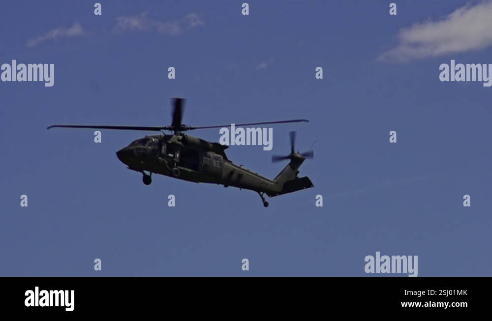 View Of Sikorsky UH-60 Black Hawk Flying In Air Against Blue Skies ...