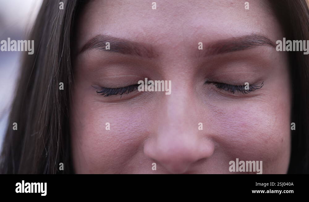 Calm woman closing eyes in meditation. Macro closeup of female adult ...