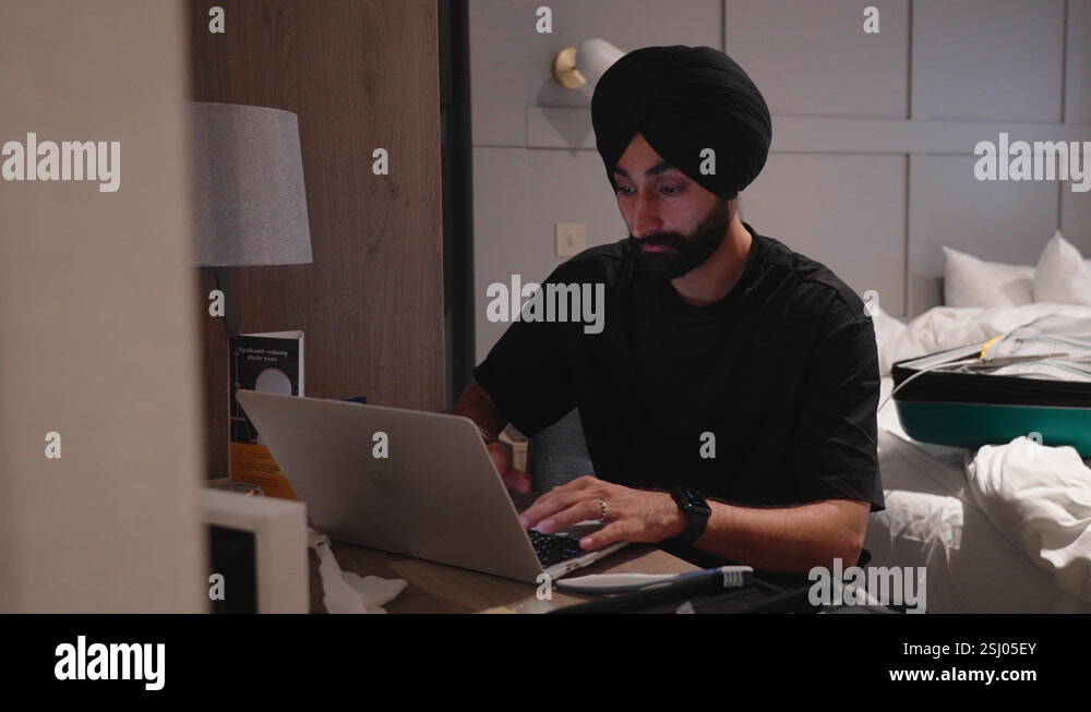 Man in turban using Stock Videos & Footage - HD and 4K Video Clips - Alamy