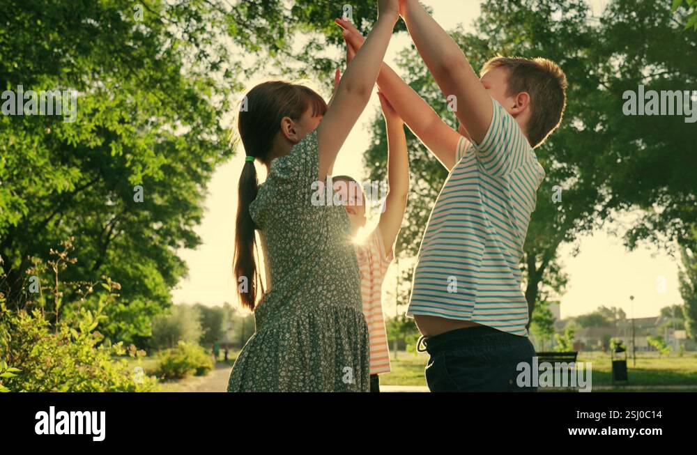 Boy girl greet hands. Childrens teamwork, group of children play in ...